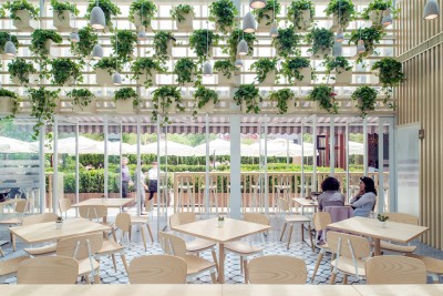 Transformed greenhouse into plant-lined coffee shop by the Four O Nine ...