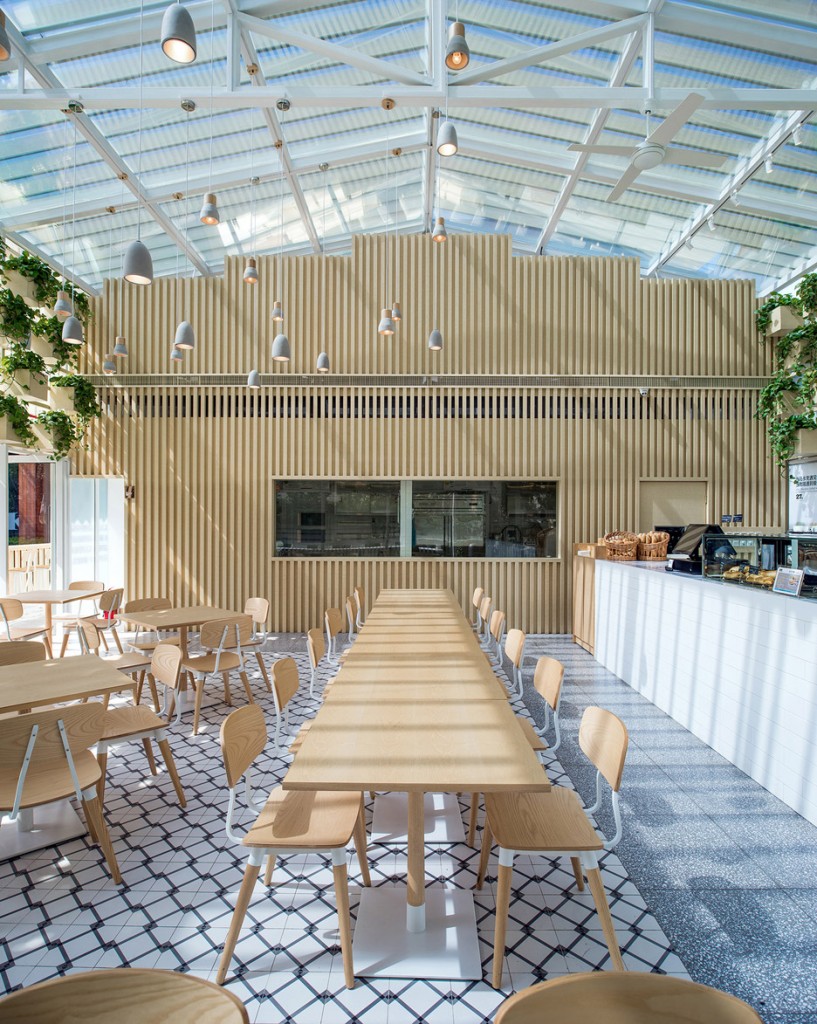 Transformed greenhouse into plant-lined coffee shop by the Four O Nine ...